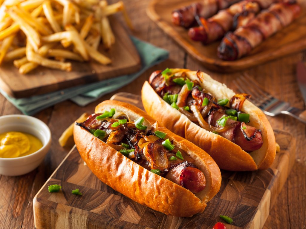 Bacon wrapped hot dogs with crispy onions - Helen Browning's Organics